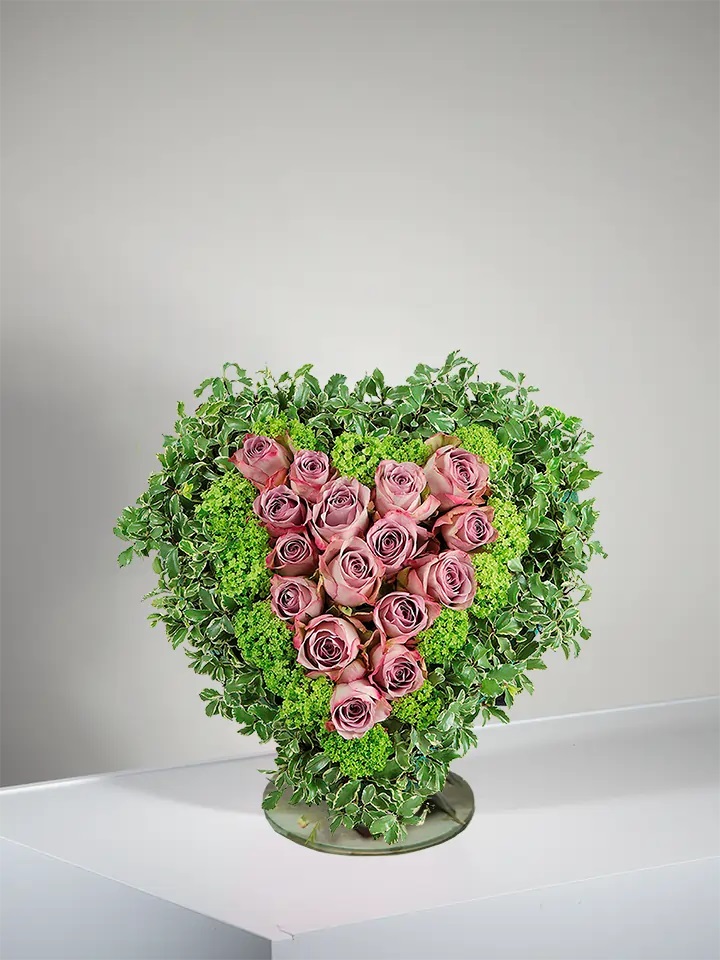 Heart-shaped arrangement of Pink Roses and Viburno - Teleflora ...